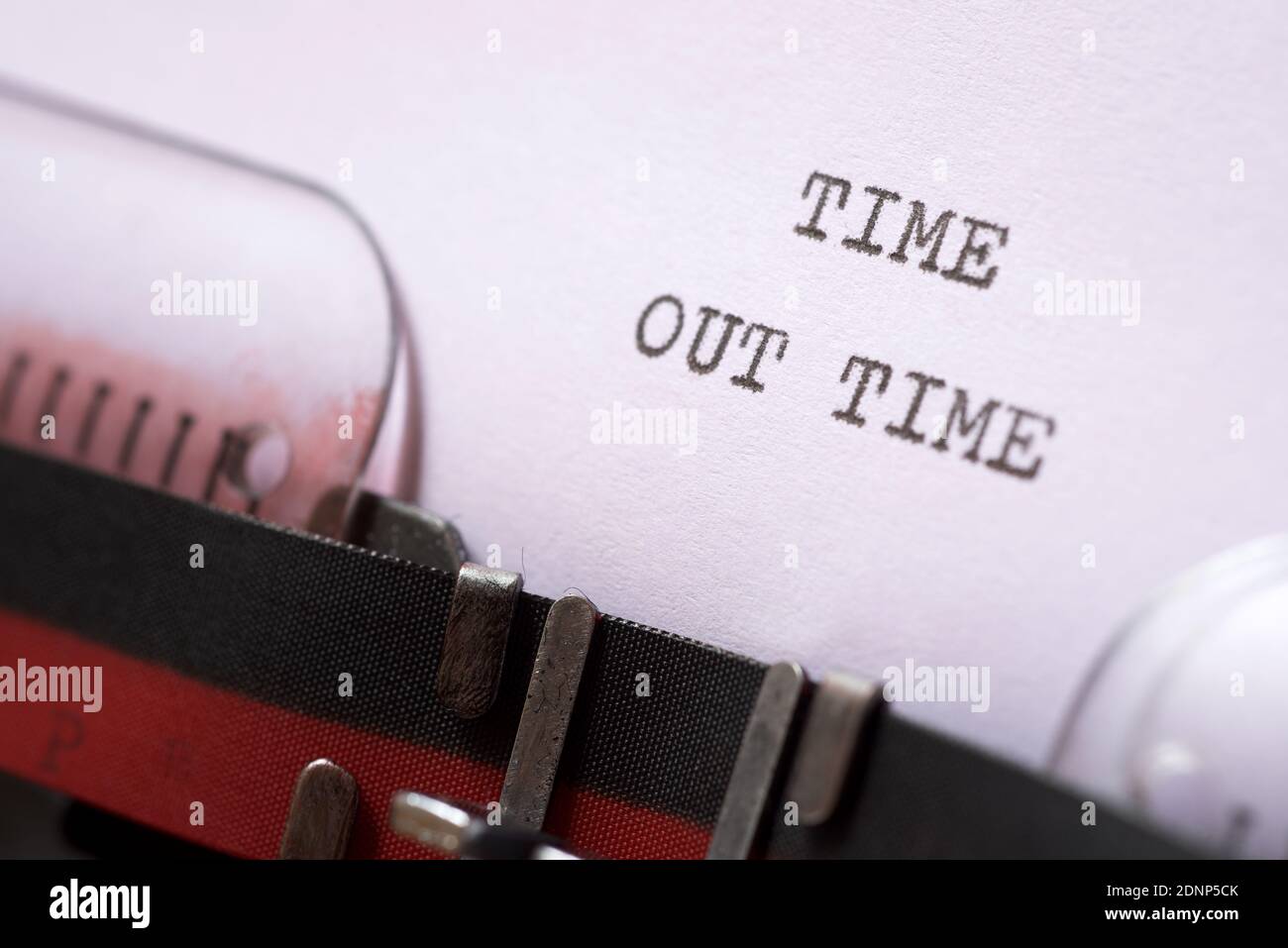 Time out time phrase written with a typewriter Stock Photo - Alamy