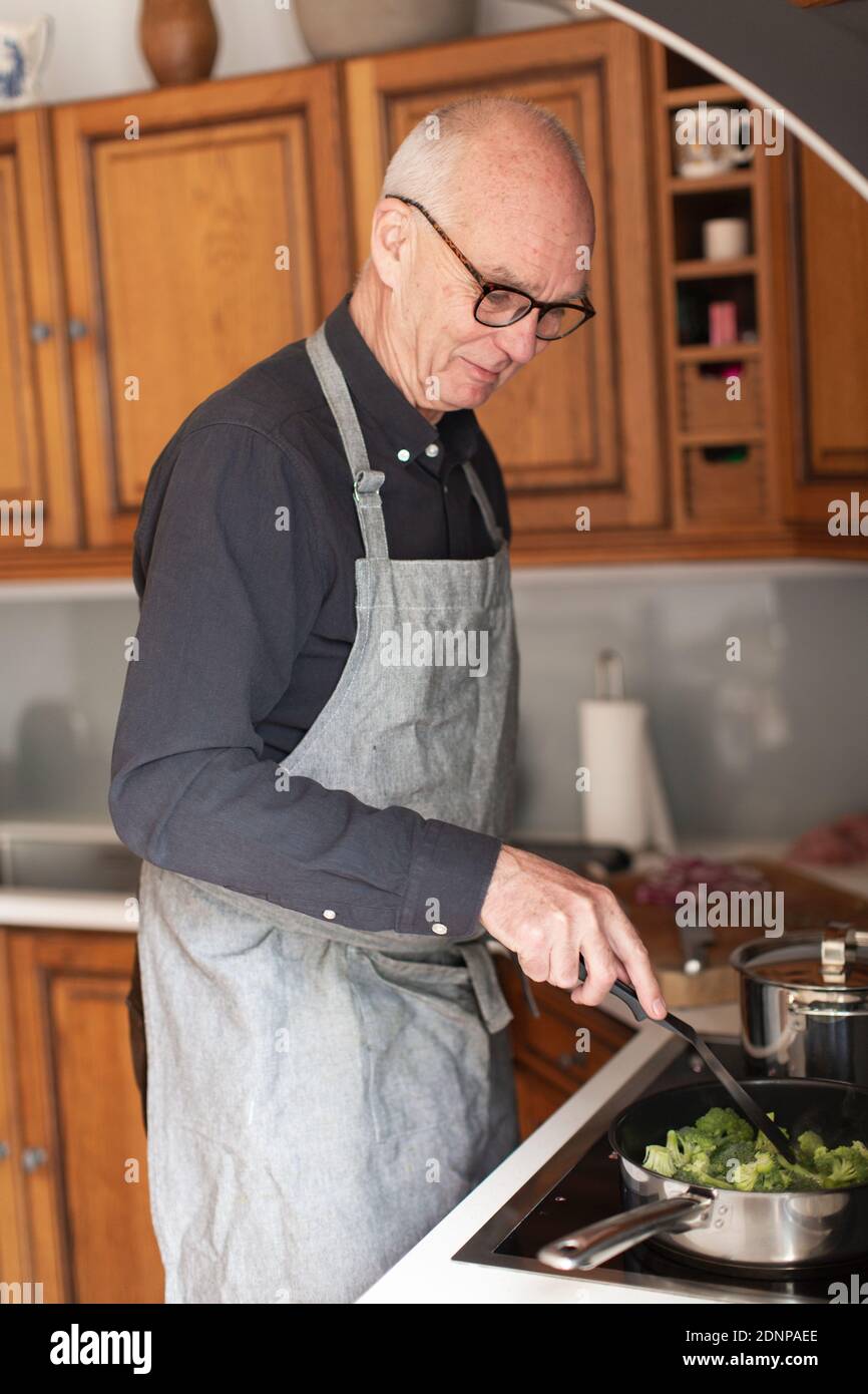 Old man cooking hi-res stock photography and images - Alamy