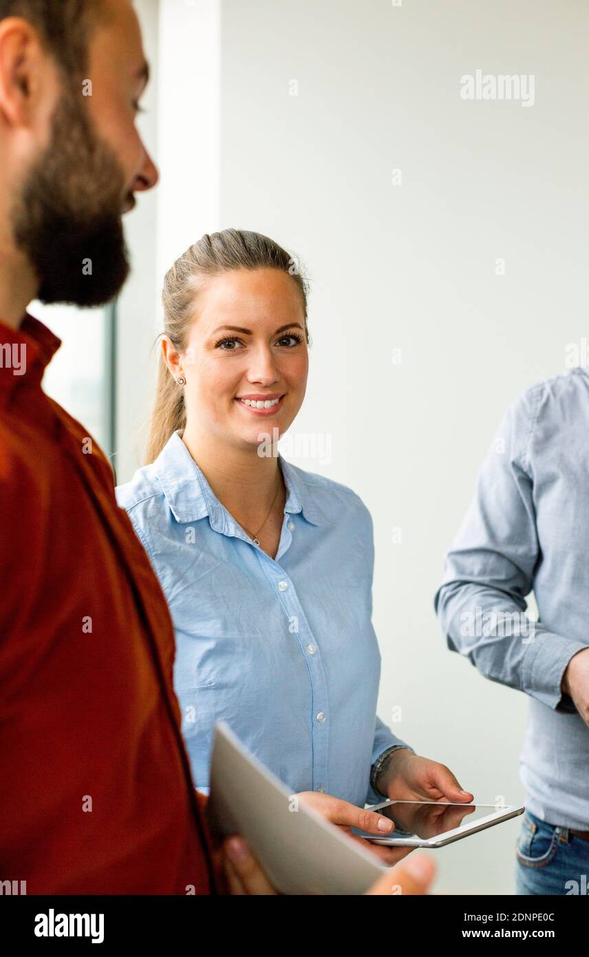 Smiling woman at work Stock Photo - Alamy