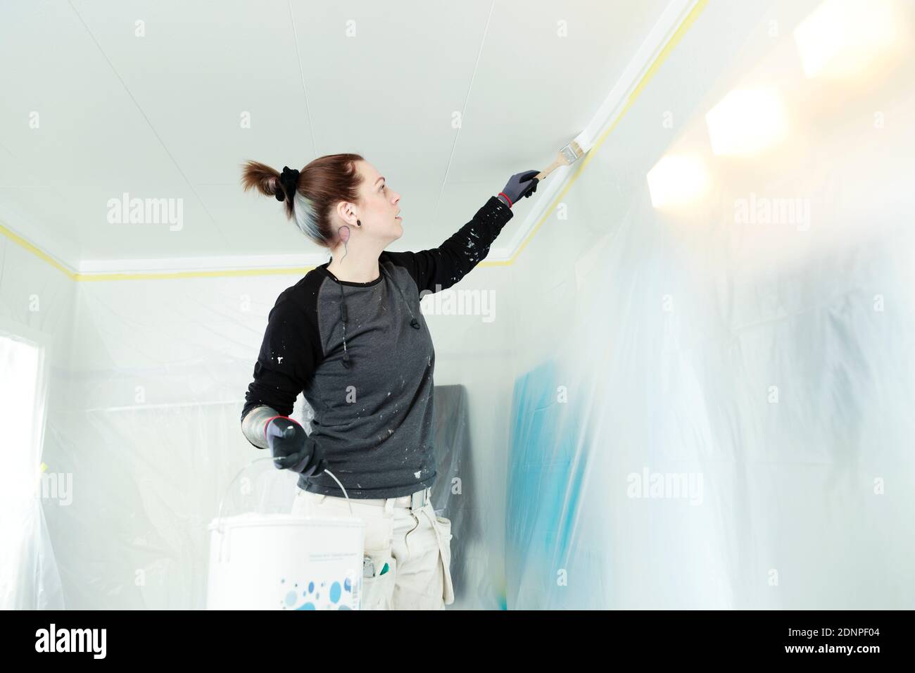 Woman looking up at ceiling hi-res stock photography and images - Alamy