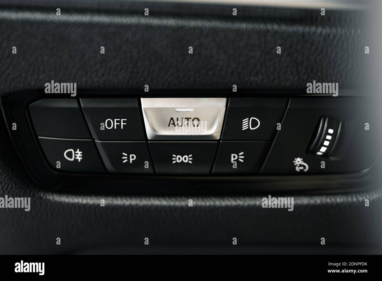 Buttons panel of the car on the dashboard Stock Photo - Alamy