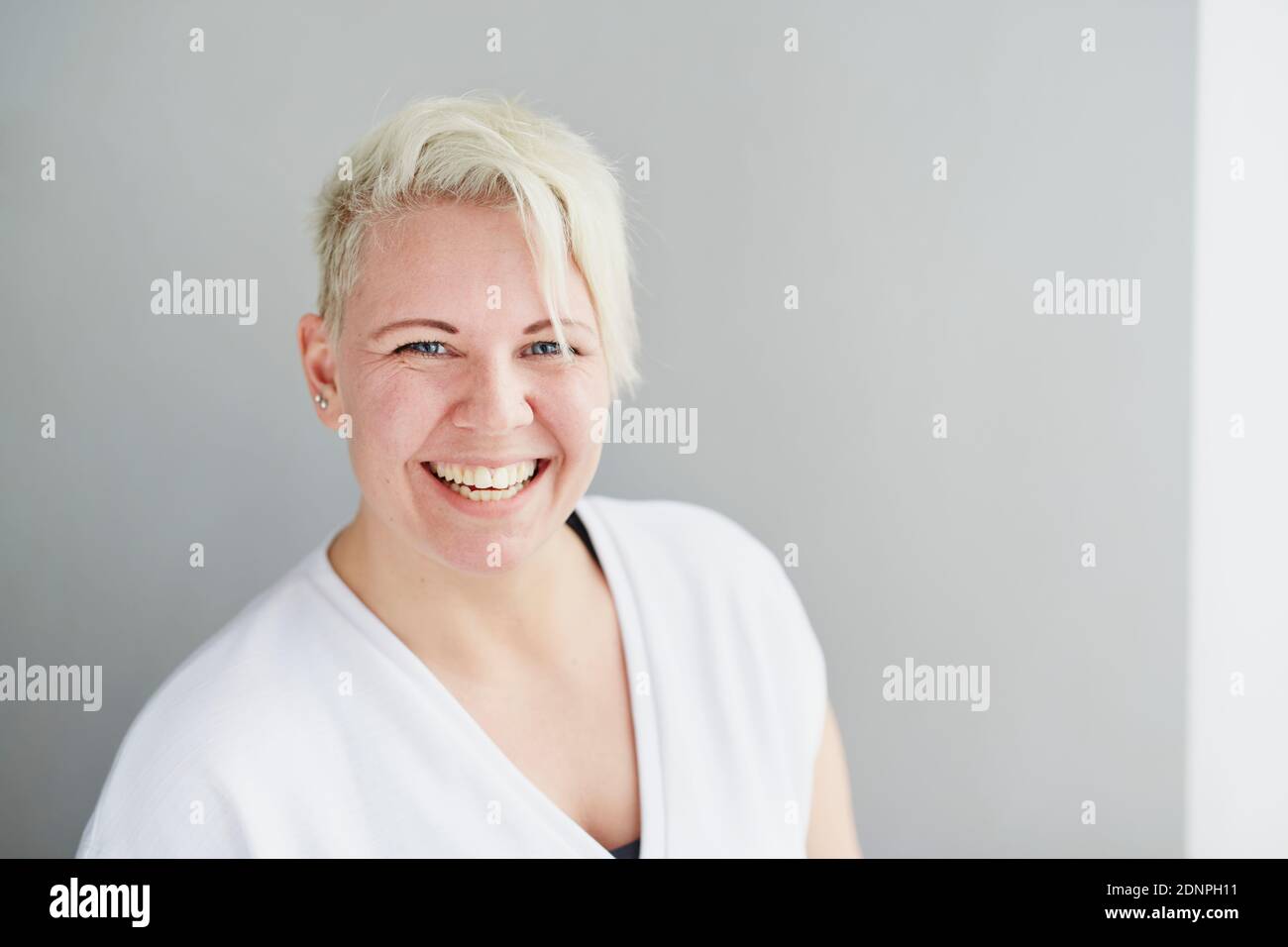 Adult portrait smiling happy studio hi-res stock photography and images ...