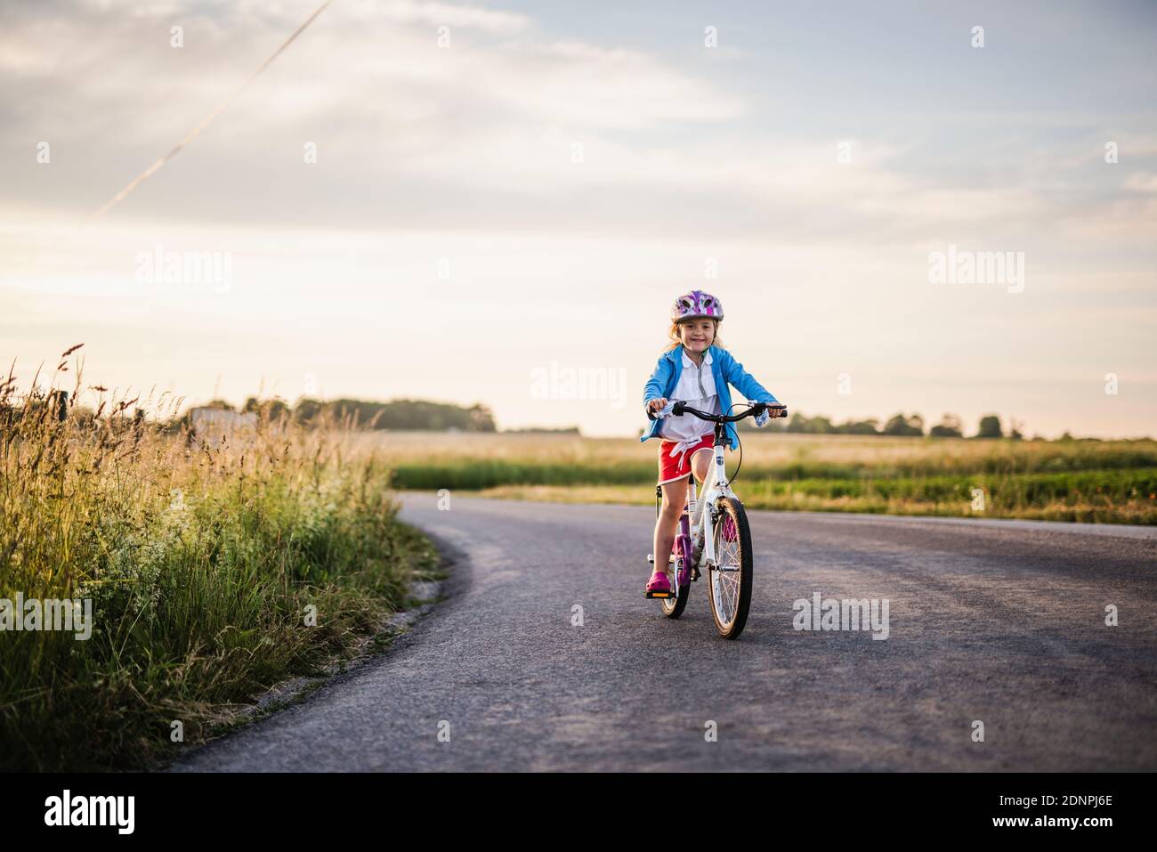 Girl on cycle hi-res stock photography and images - Alamy
