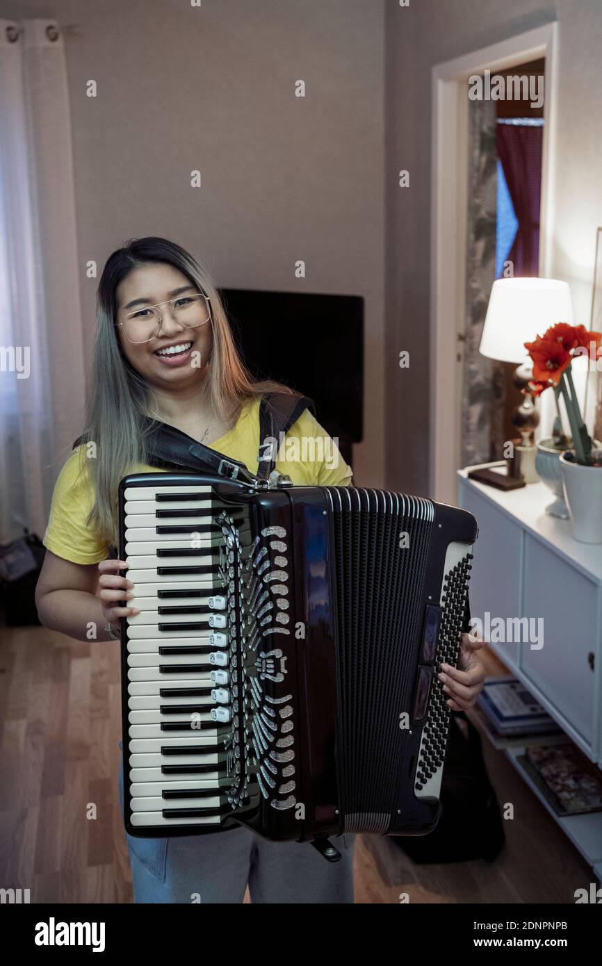 Woman with musical instrument hi-res stock photography and images - Alamy