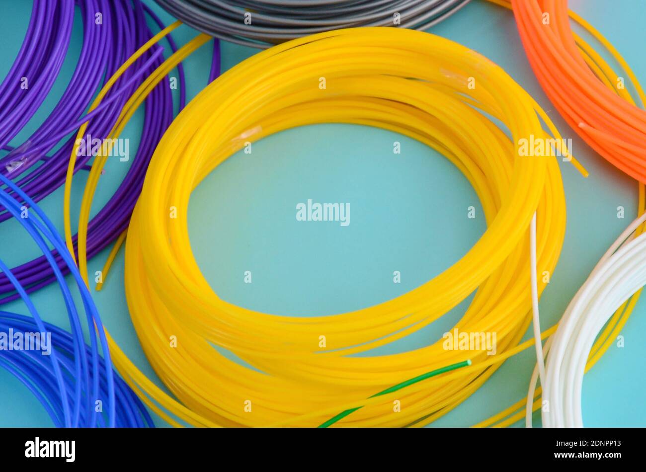 Colorful Cables On Blue Background Stock Photo - Alamy