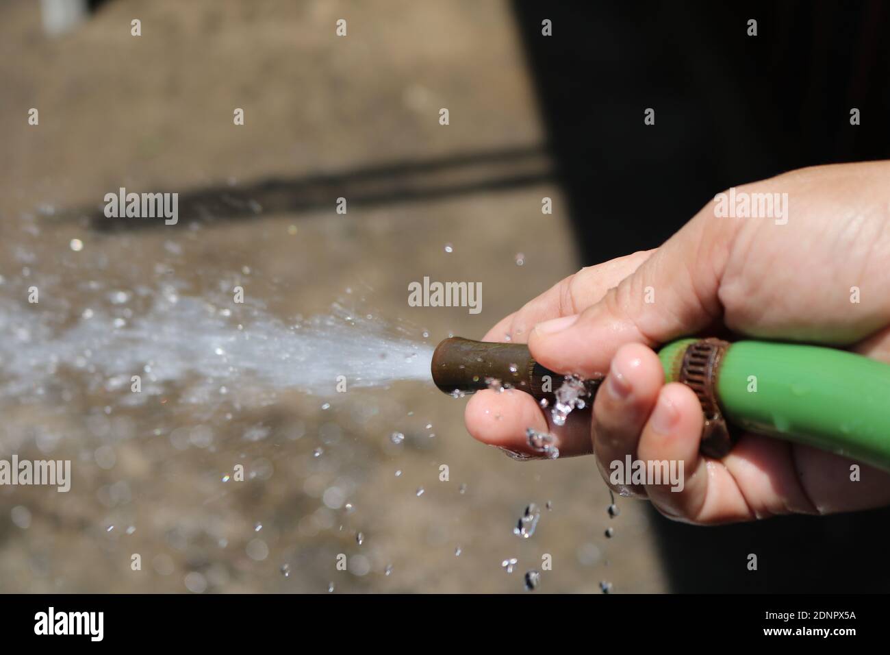 Hose water finger hi-res stock photography and images - Alamy