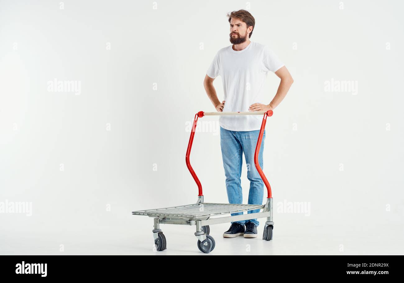 Transporting heavy bag hi-res stock photography and images - Alamy