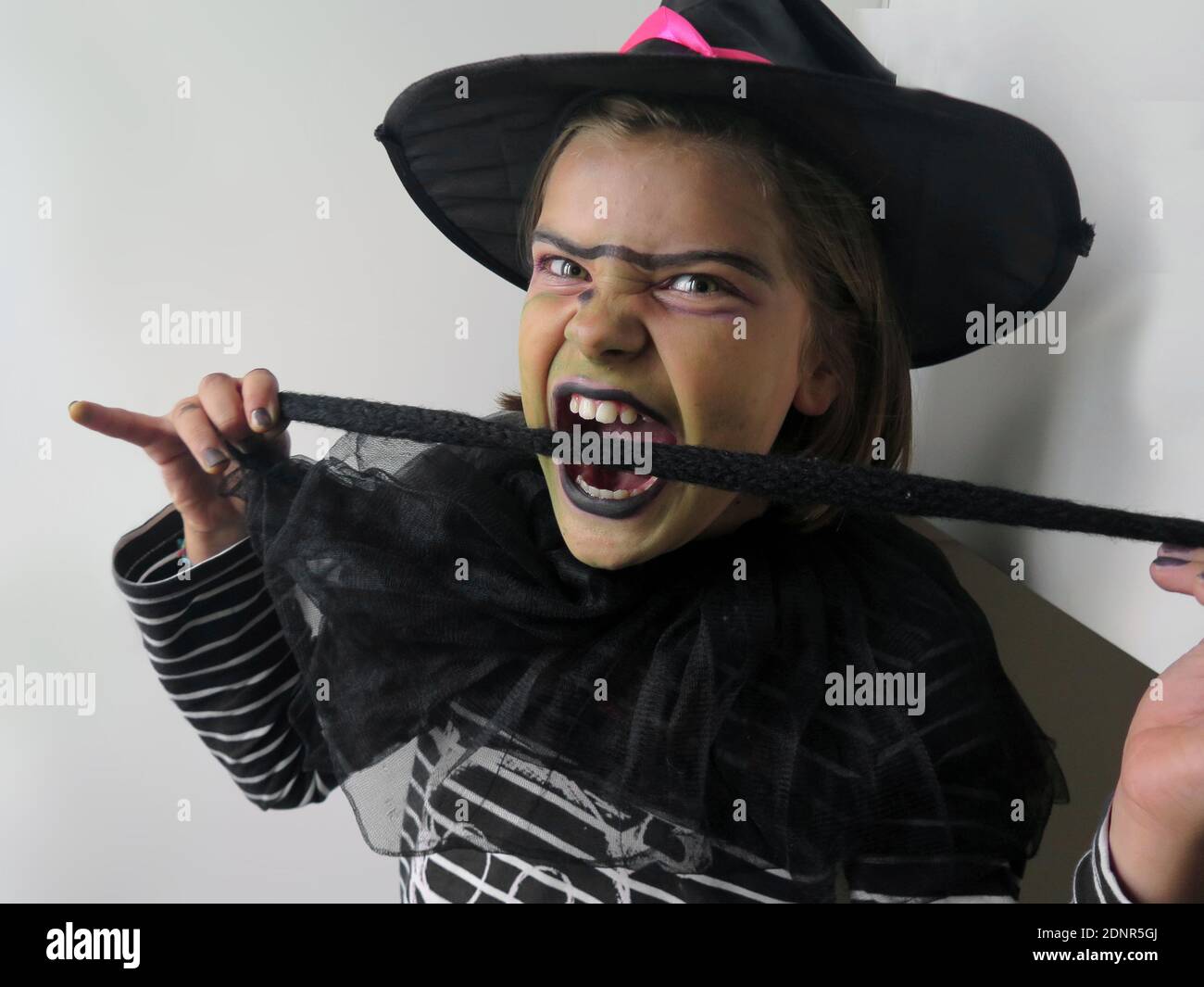 Biting cloth hi-res stock photography and images - Alamy