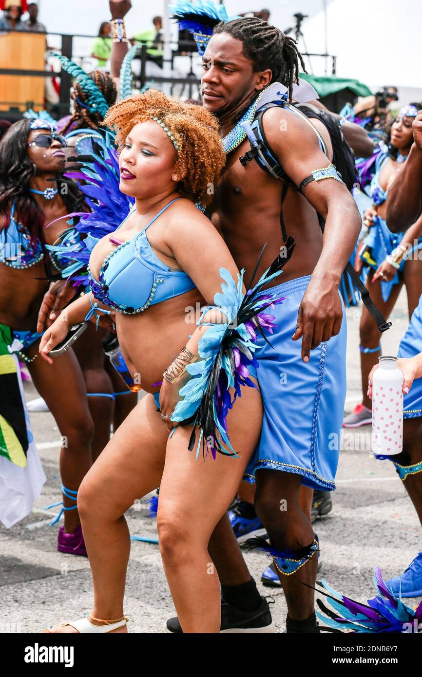 Participants dressed in colorful costumes at the Toronto Caribbean Carnival Grand Parade, a ...