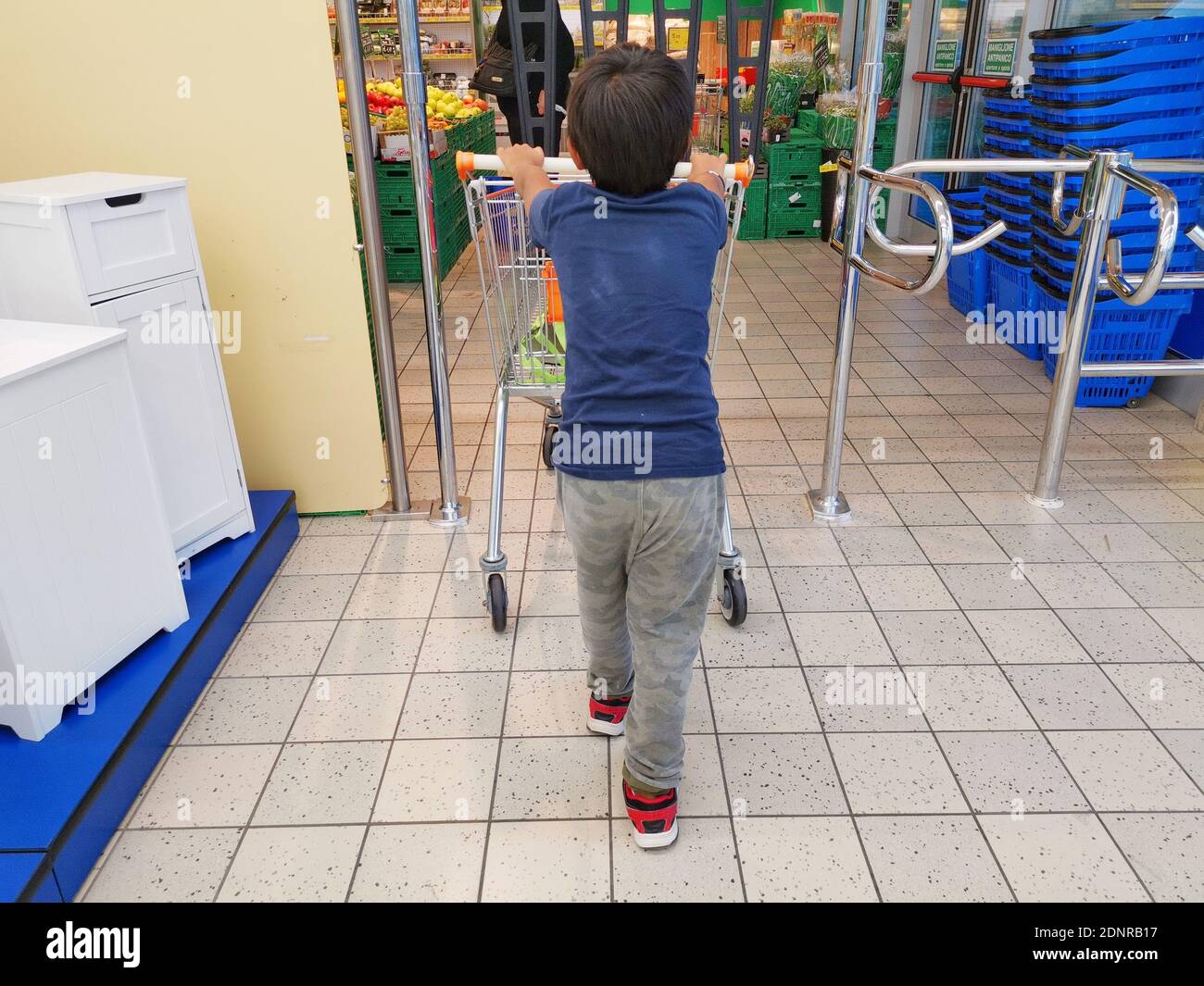 Boys Pushing Cart High Resolution Stock Photography and Images - Alamy