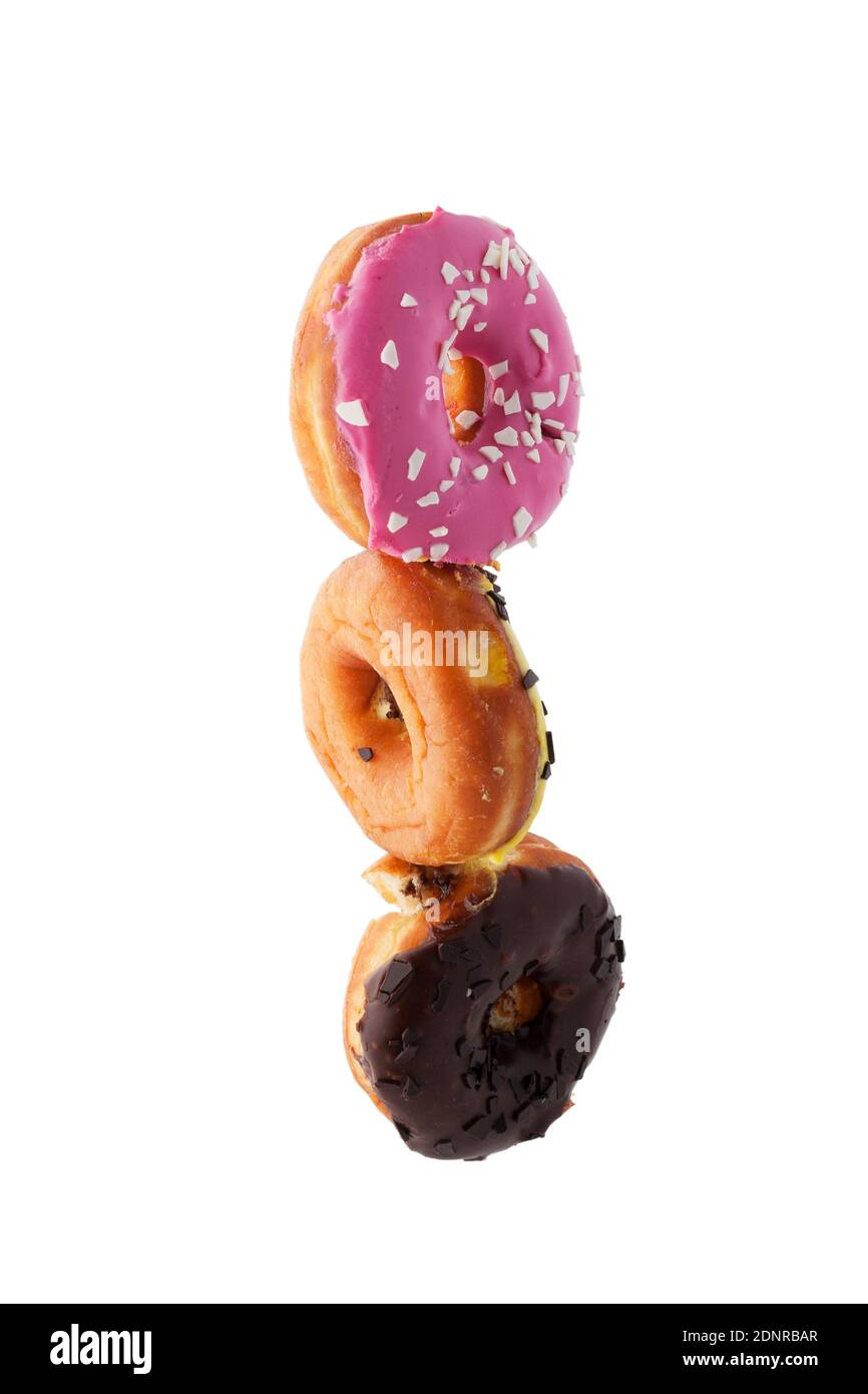 Sweet donuts. Dessert assorted donuts on a white plate Stock Photo - Alamy