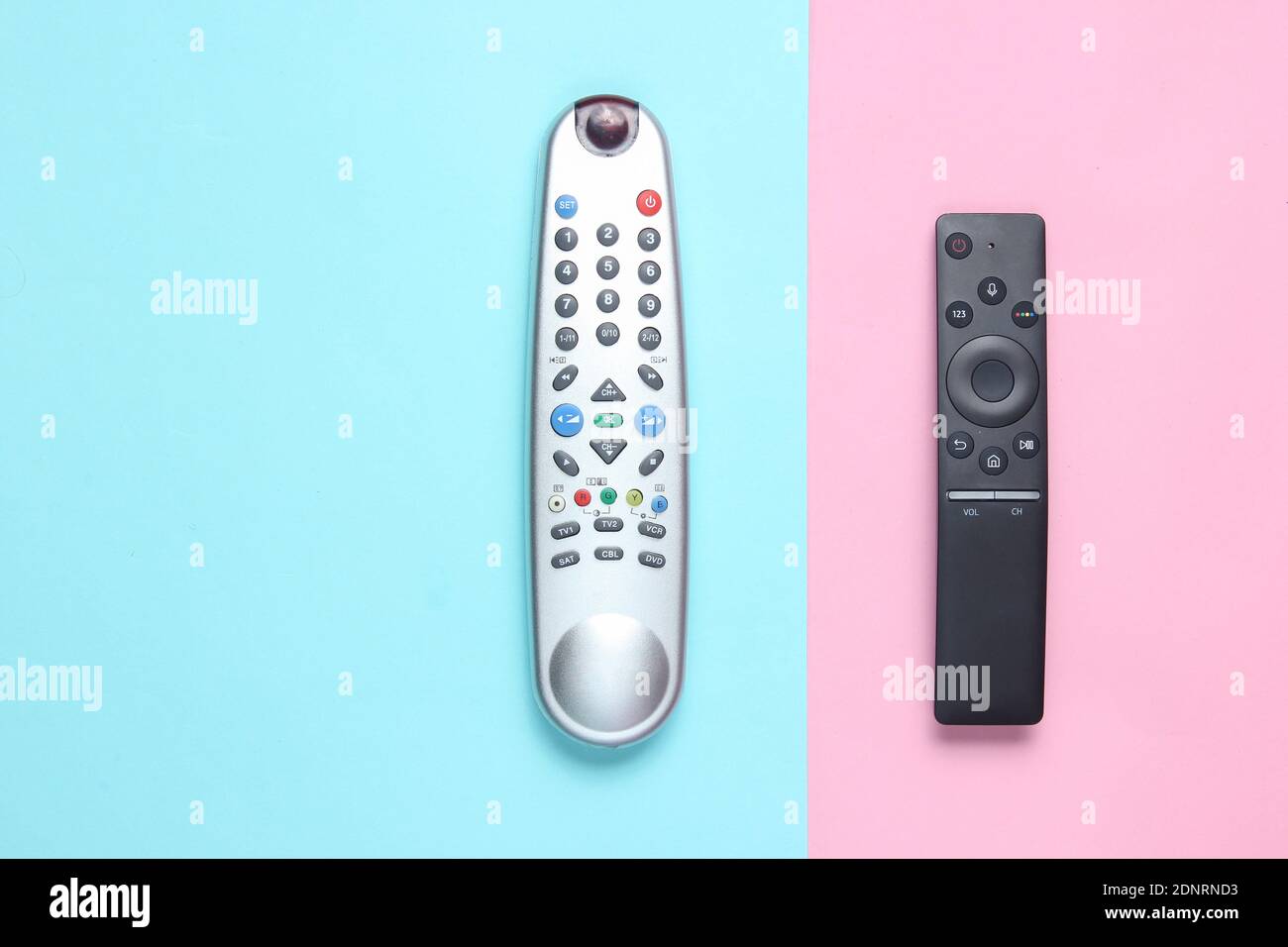 Two modern tv remote on pastel background. Top view, minimalism Stock ...