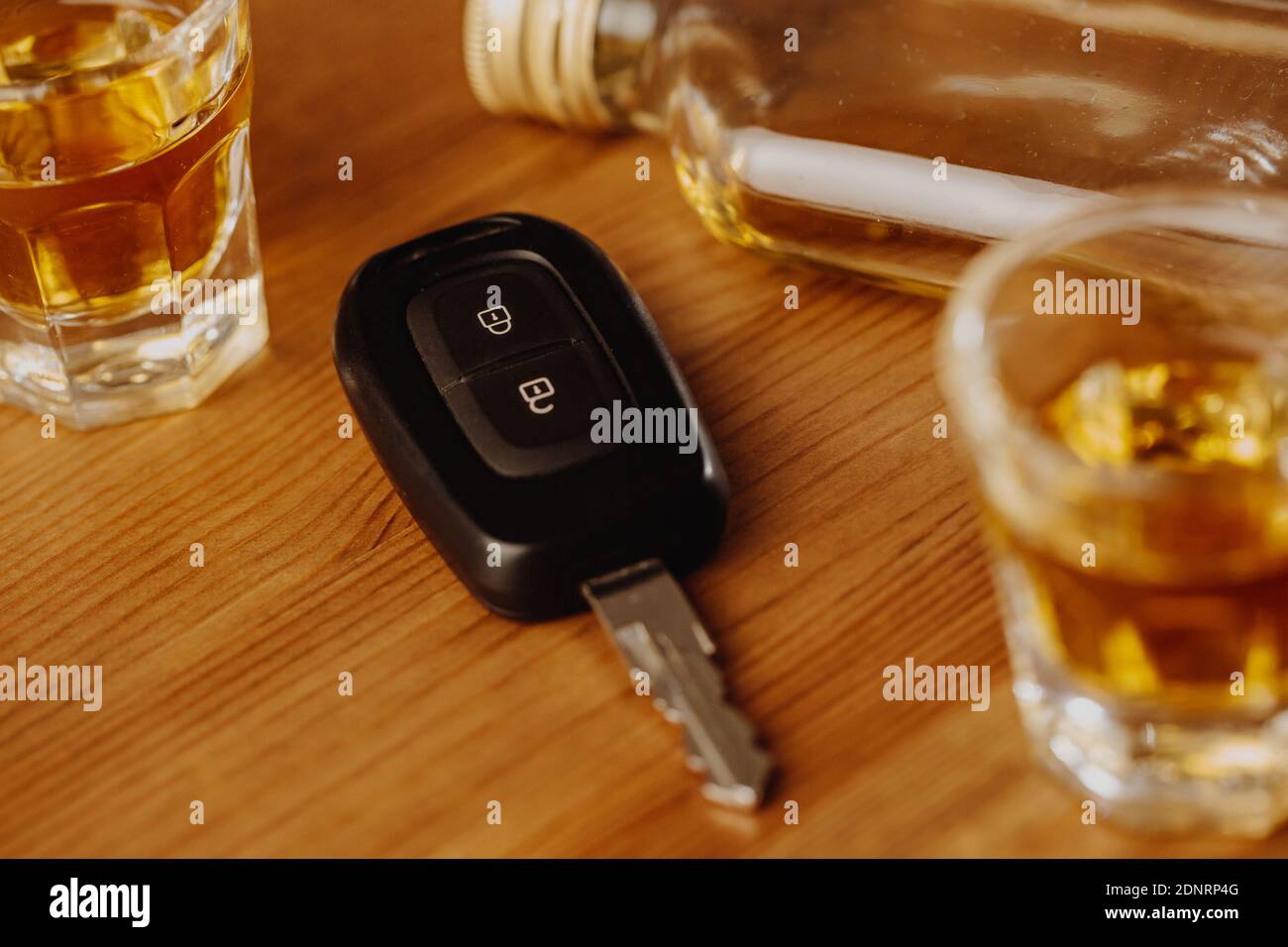 Do not drink and drive concept, Close up of car keys and glass of ...