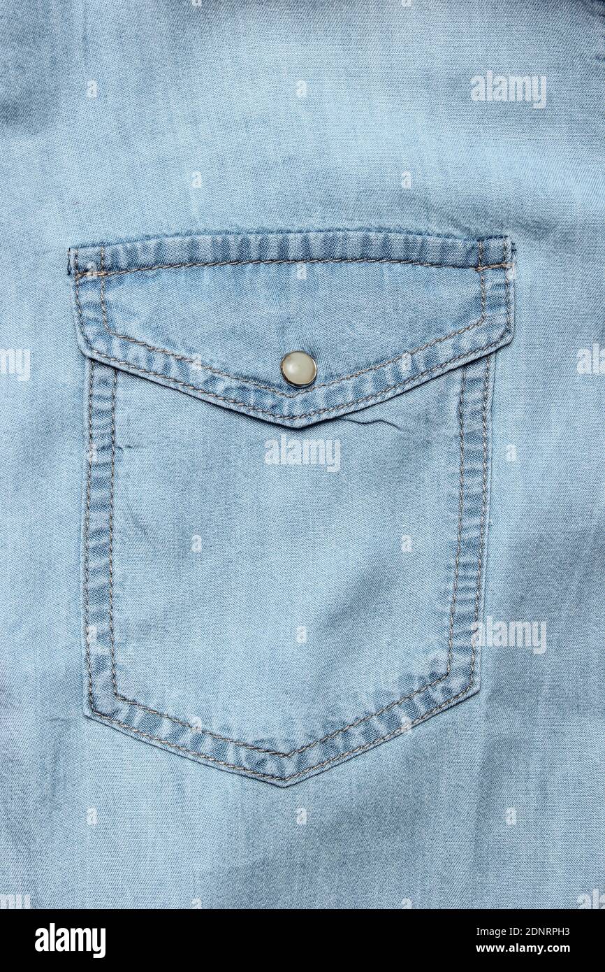 Pocket blue denim shirt Stock Photo - Alamy