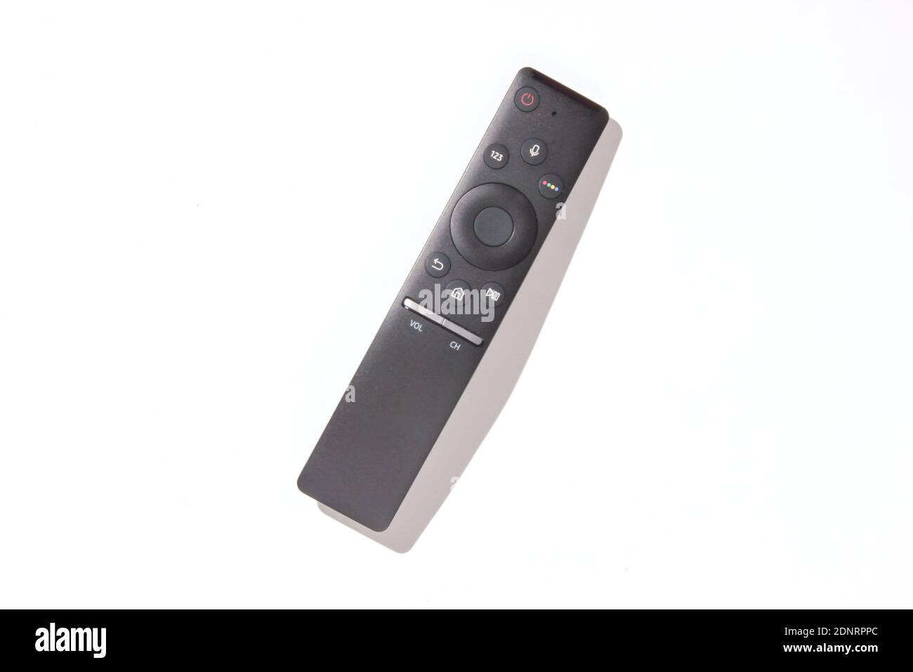 Modern tv remote on a white background. Photo with shadows, hard light ...