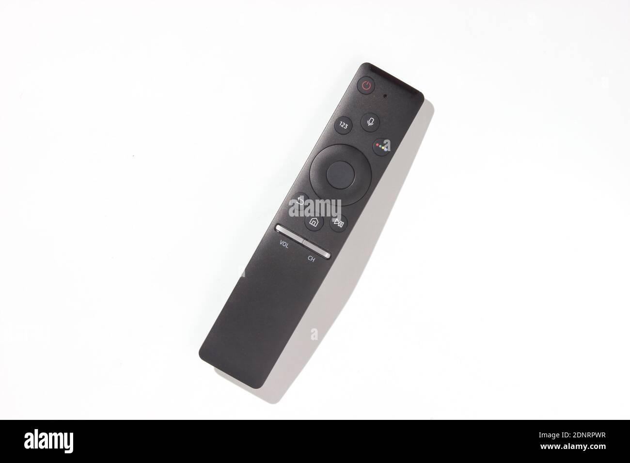 Modern tv remote on a white background. Photo with shadows, hard light ...