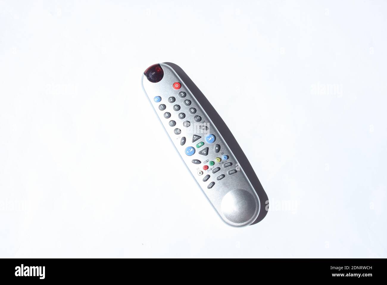 Tv remote on a white background. Photo with shadows, hard light. Top ...