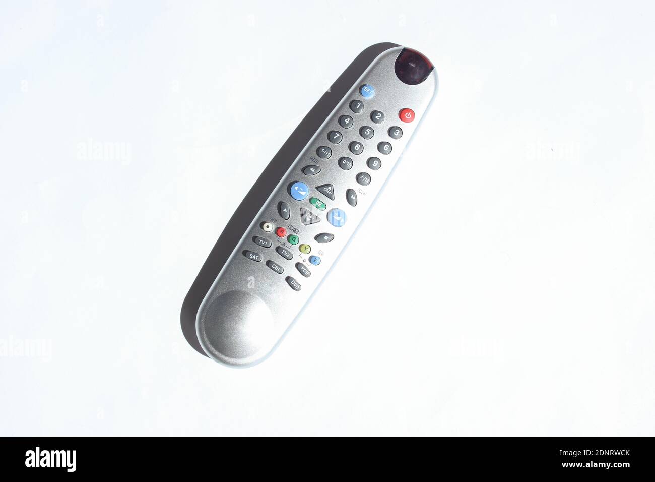 Tv remote on a white background. Photo with shadows, hard light. Top ...