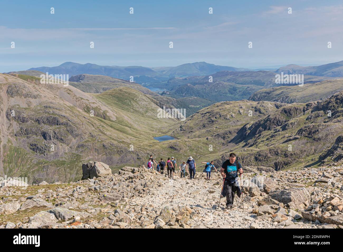 Hikers approaching the summit of Scafell Pike Stock Photo - Alamy
