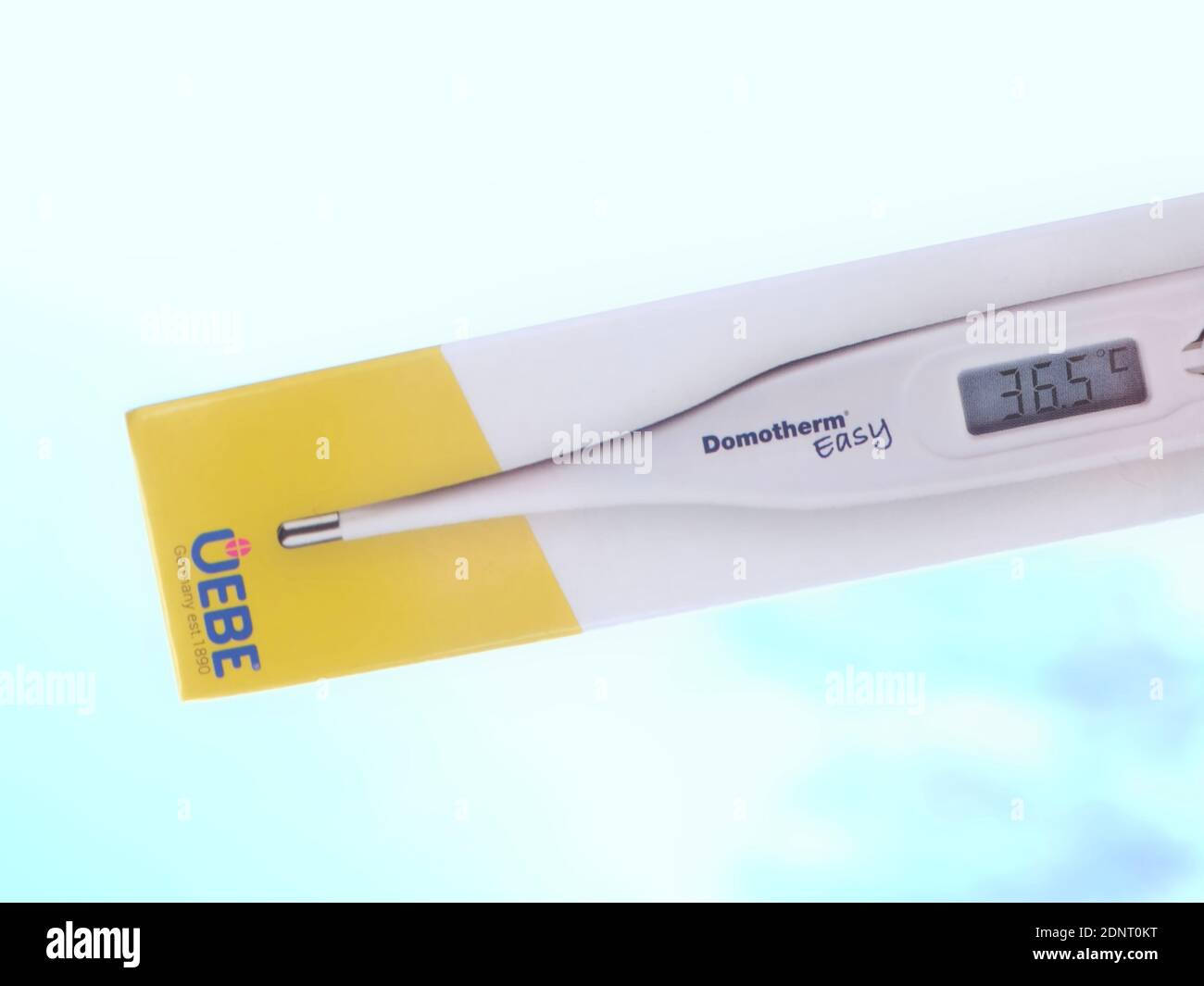 Medical thermometer to measure fever in a package Stock Photo - Alamy