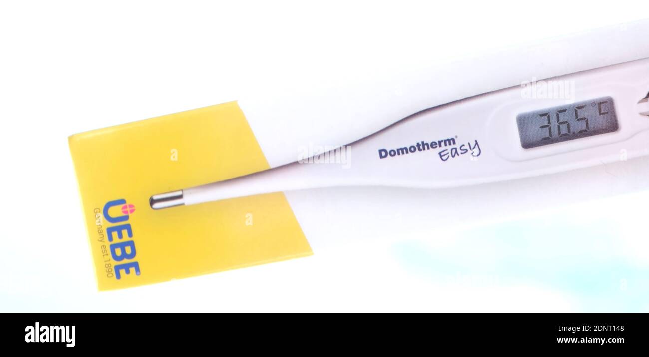 Medical thermometer to measure fever in a package Stock Photo - Alamy
