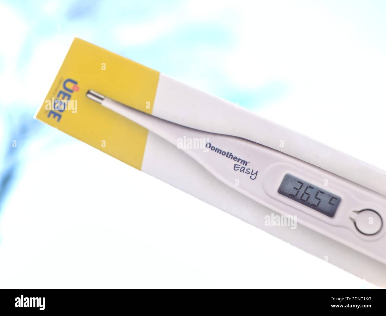 Medical thermometer to measure fever in a package Stock Photo - Alamy