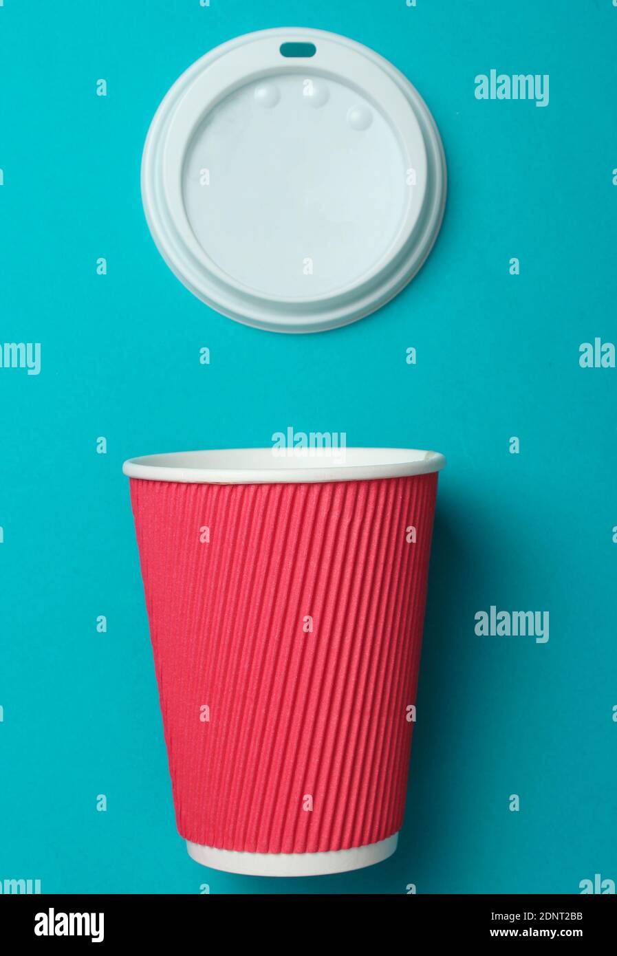 Empty paper coffee cup on a blue background, top view, minimalism Stock ...