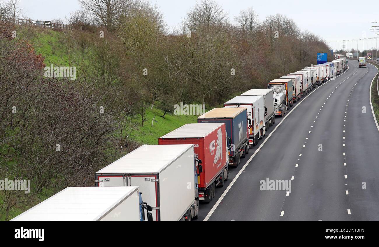 Lorries queue on the M20 to enter the Eurotunnel site in Folkestone ...