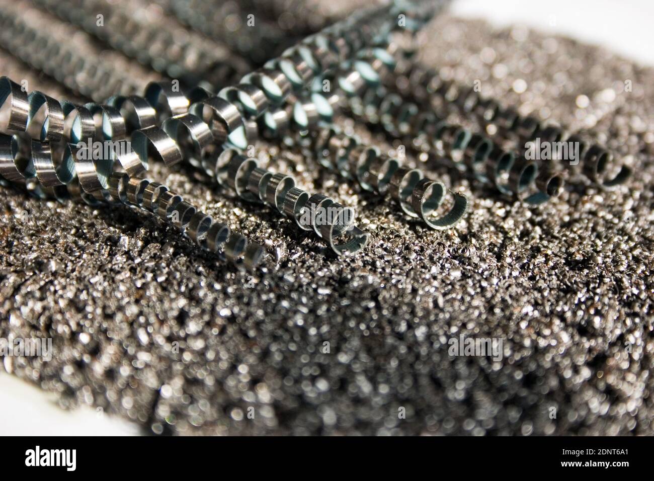 Twisted and chipped metal shavings (a waste from the metalworking ...