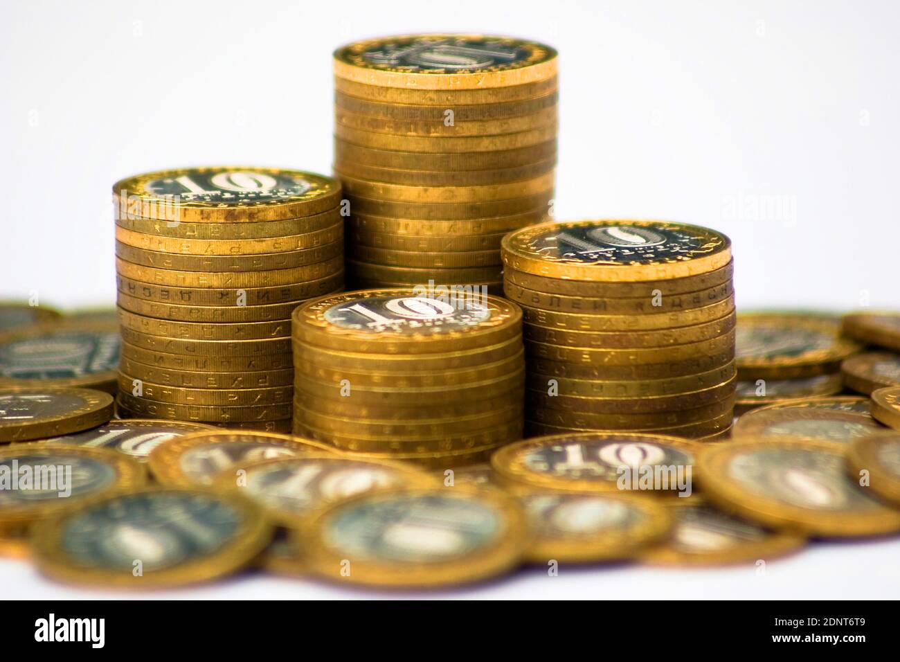 Russian coins in a stack. A lot of Russian ten-ruble coins are in a ...