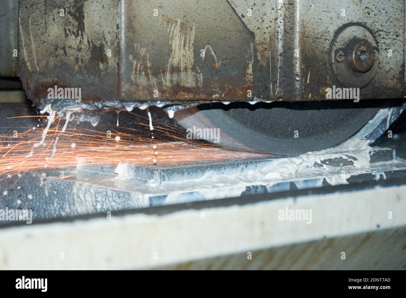 Grinding a metal plate. Metal plate surface machining - grinding ...