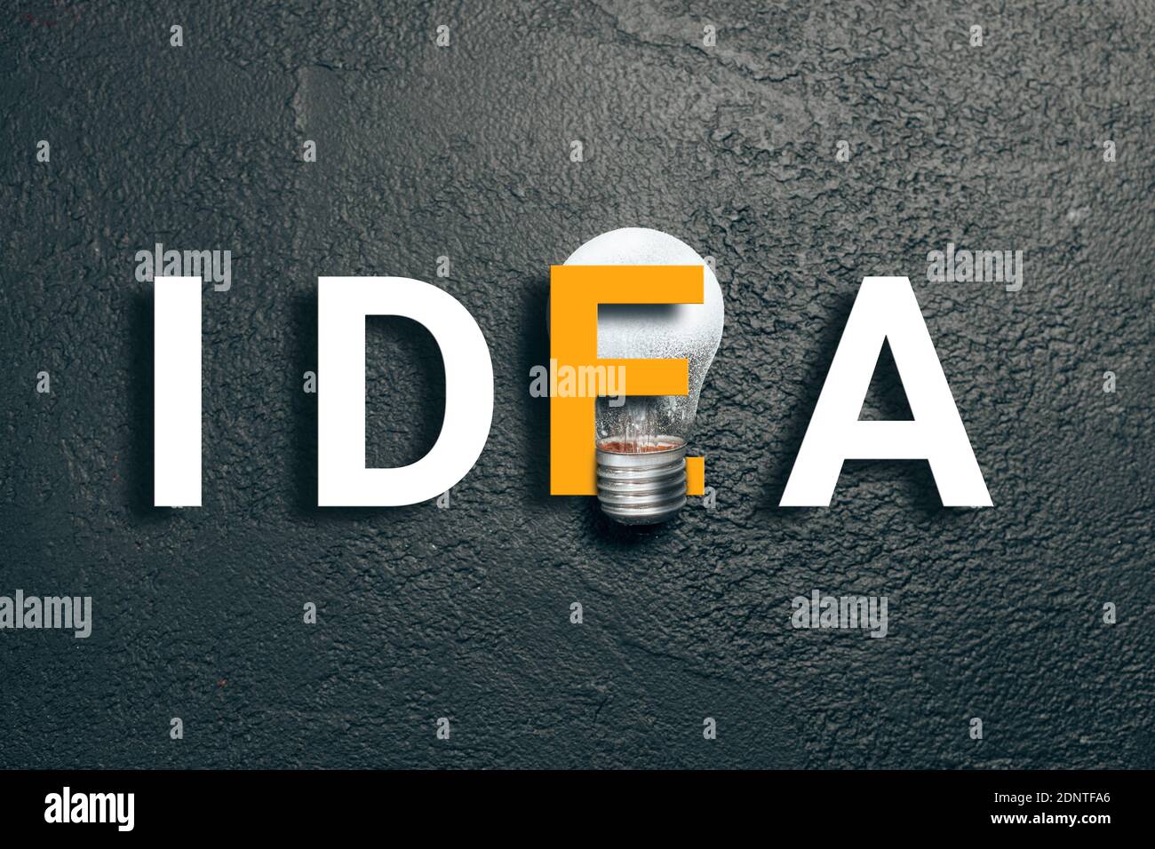2021 idea minimal concept. White text with glass glowing light bulb on ...