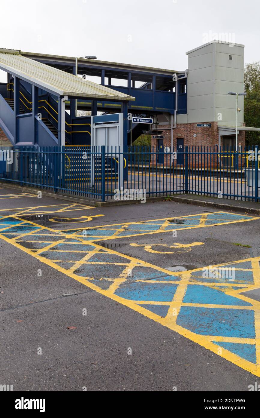 Railway train station at Axminster, Devon UK on a grey wet day in ...