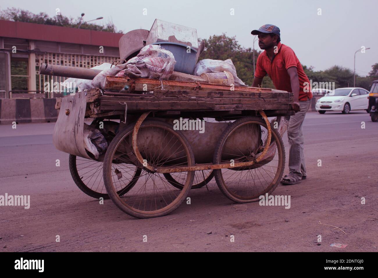 Indian man on cart full hi-res stock photography and images - Alamy