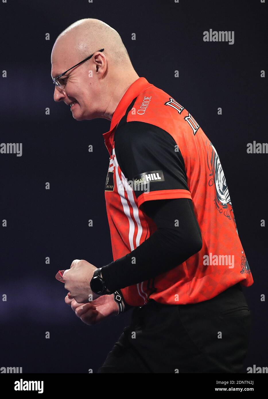 Mickey Mansell celebrates after winning his match during day four of ...