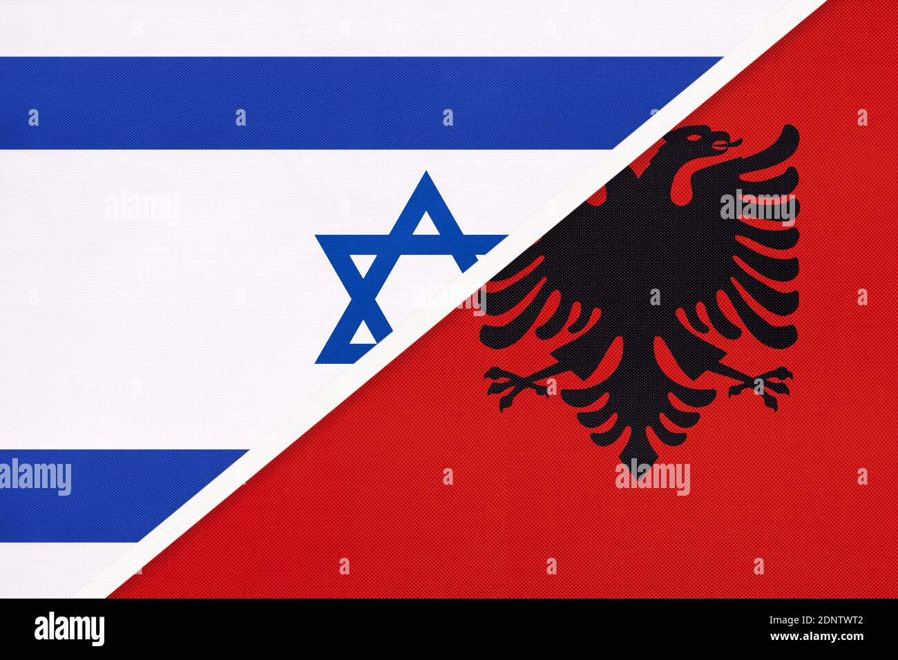 Israel and Albania, national flags from textile. Relationship ...