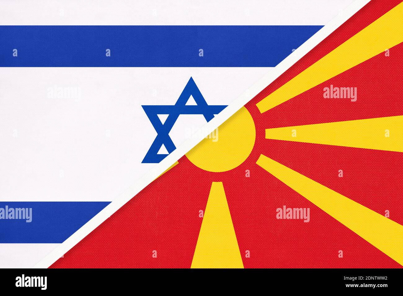 Israel and North Macedonia, national flags from textile. Relationship ...