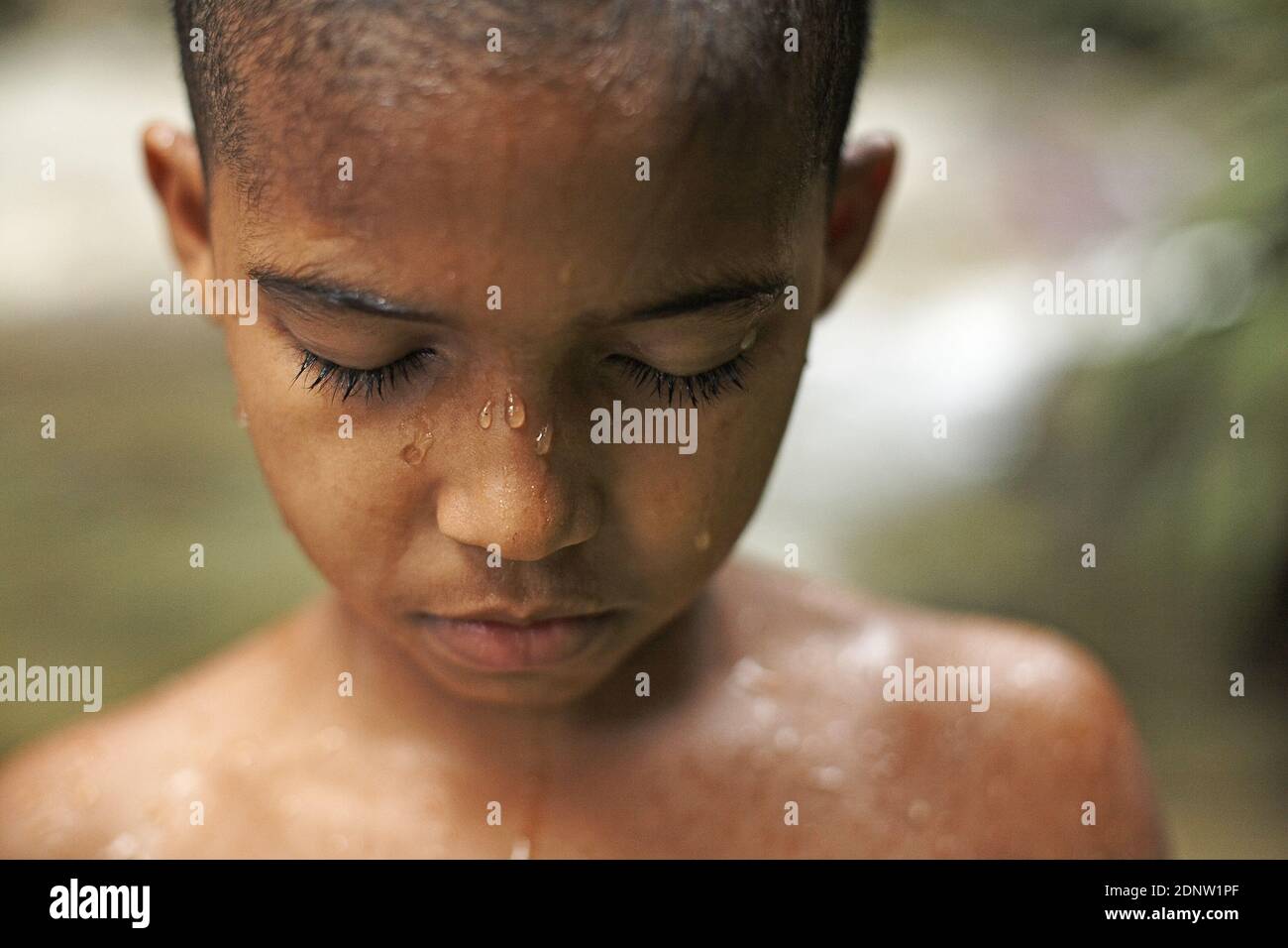 boys face covered with drops of water Stock Photo - Alamy