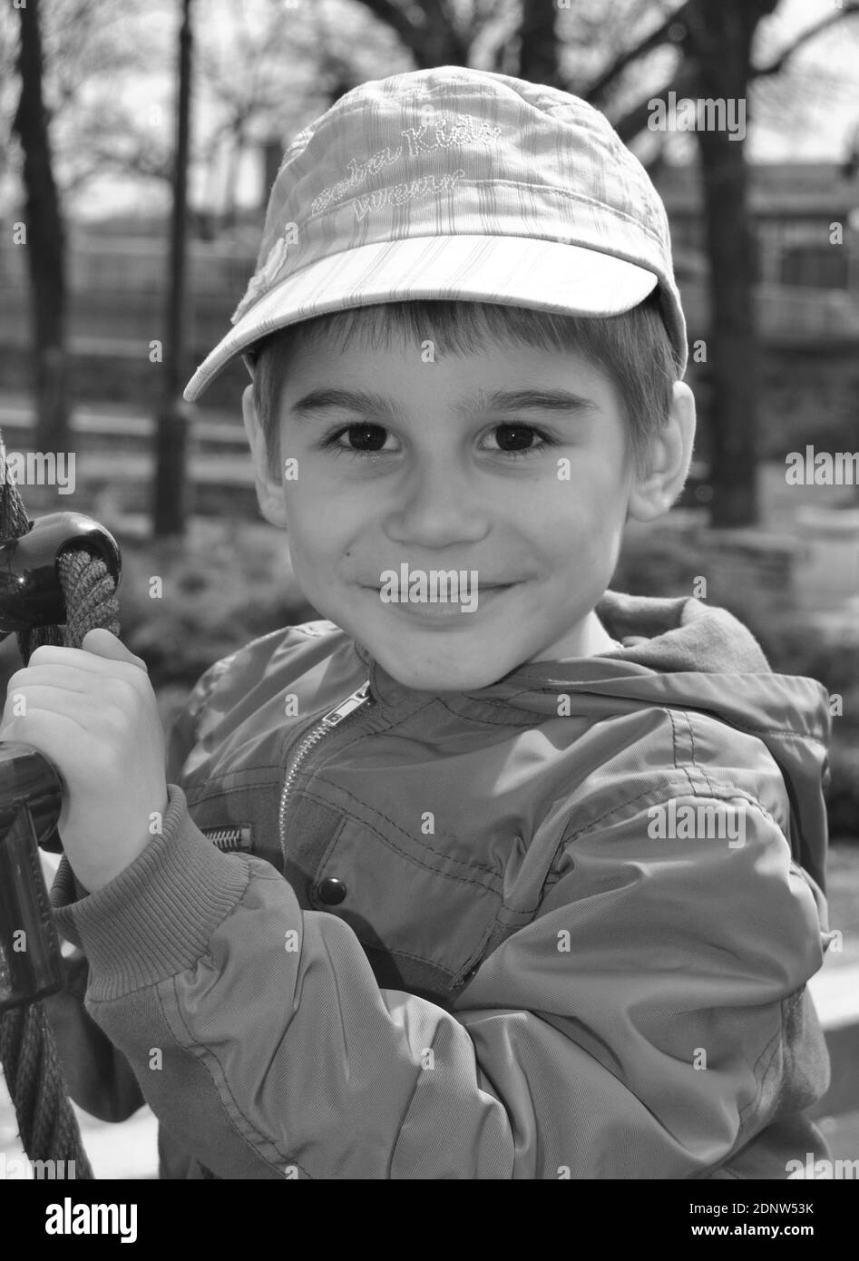 Boy with cap Black and White Stock Photos & Images - Alamy