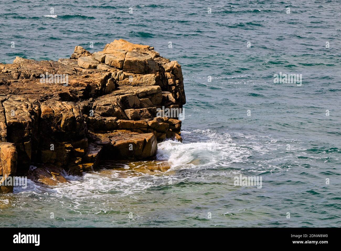 water flowing into the rocks Stock Photo - Alamy