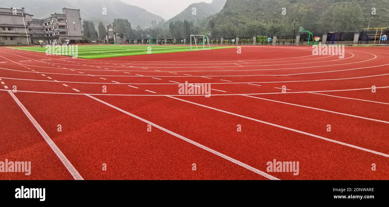 The western mountain area of a primary school stadium Stock Photo - Alamy