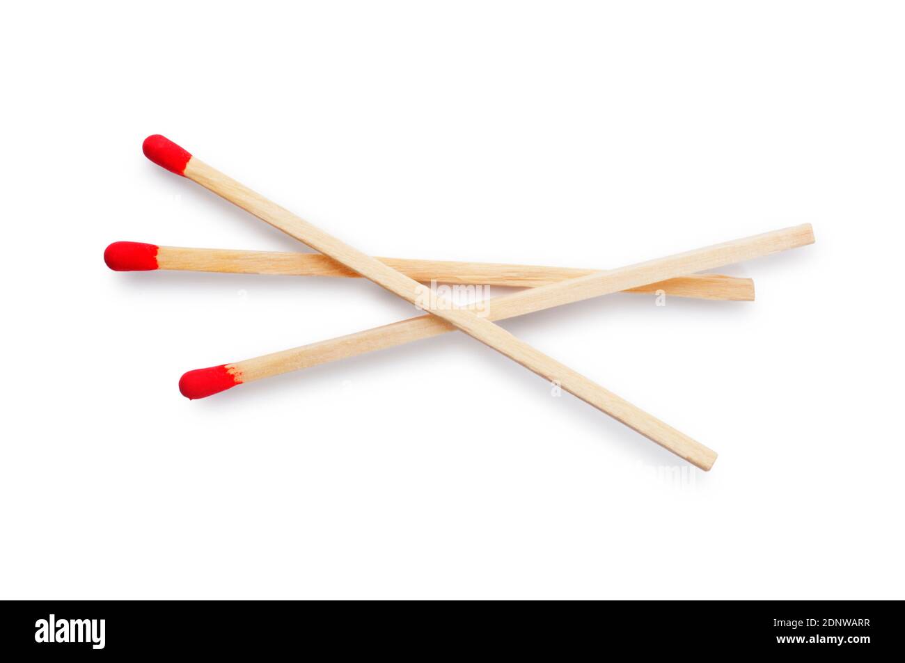 Studio shot of red tipped matches cut out against a white background ...