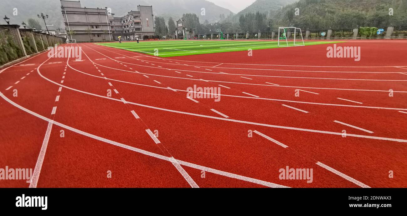 The western mountain area of a primary school stadium Stock Photo - Alamy