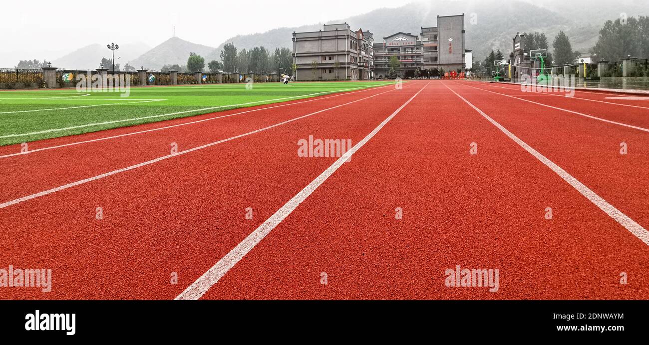 The western mountain area of a primary school stadium Stock Photo - Alamy