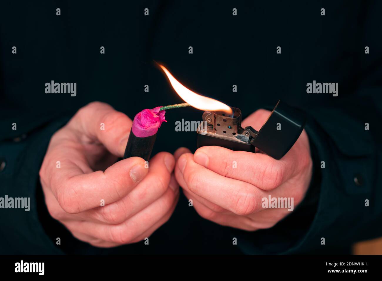 Setting Fire to the Firecracker. Man in Black Clothes Lighting Up the ...