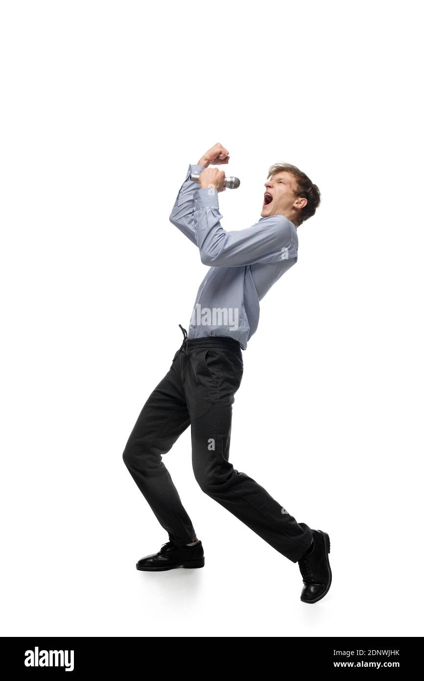 Singer. Happy young man dancing in casual clothes or suit, remaking ...