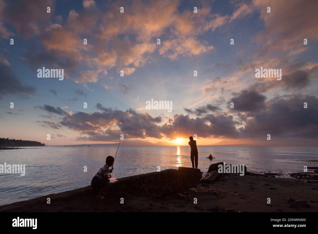 Beautiful sunrise on Cacalan beach, Banyuwangi district Stock Photo - Alamy