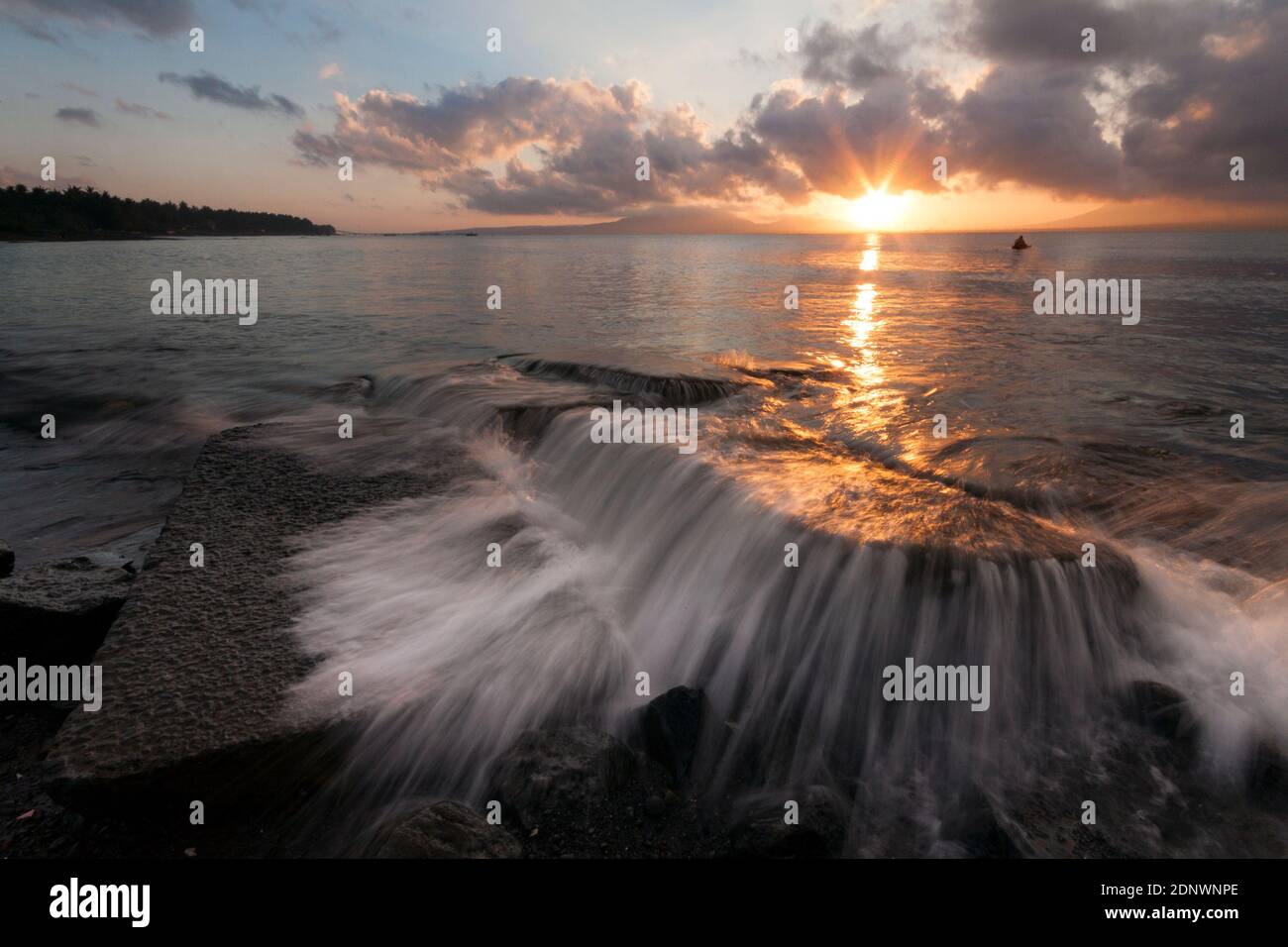 Beautiful sunrise on Cacalan beach, Banyuwangi district Stock Photo - Alamy