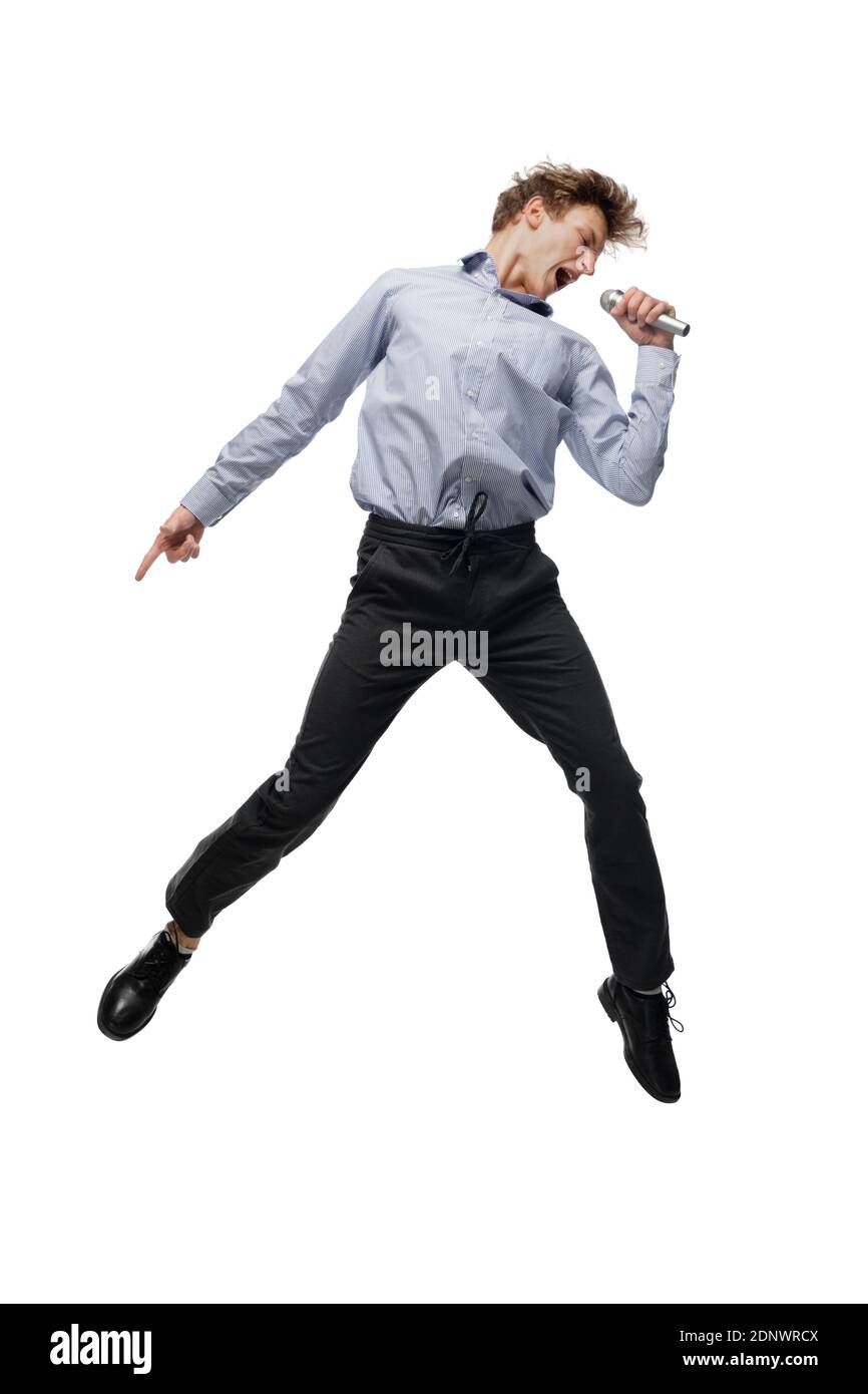 Singer. Happy young man dancing in casual clothes or suit, remaking ...