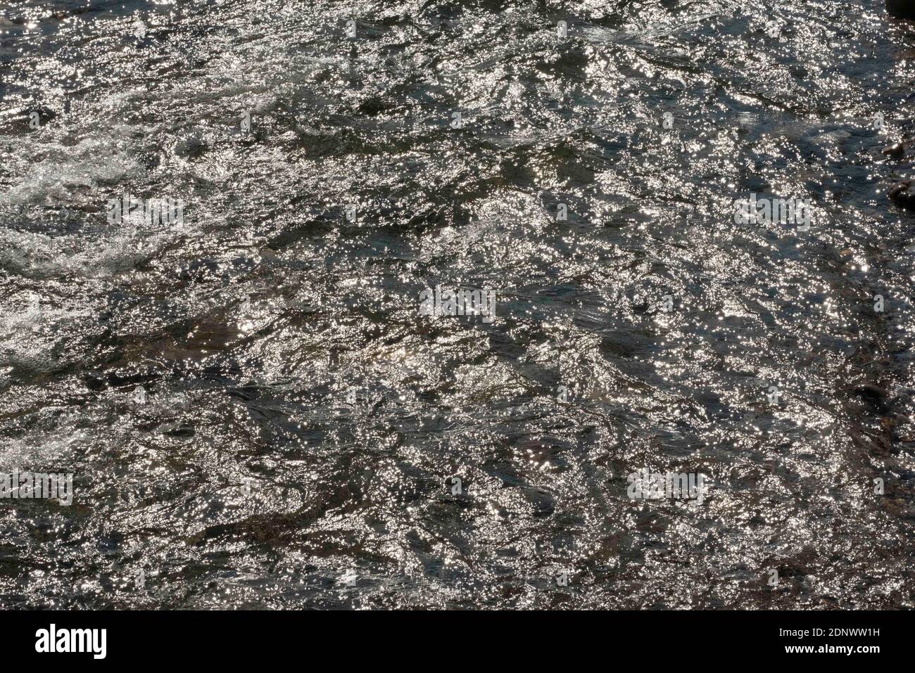 liquid patterns and textures on the flowing surface of water Stock ...